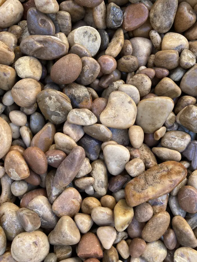 1 - 2" River Rock Cobble Bagged 40 Lb. | American Stone